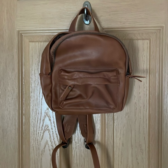 Universal Thread | Bags | Universal Thread Non Leather Material Fabric Lined Pursebackpack ...